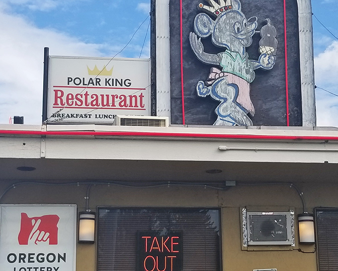 The Polar King's vintage sign and cartoon bear mascot stand as a defiant reminder that not everything needs a trendy rebrand to remain delicious.