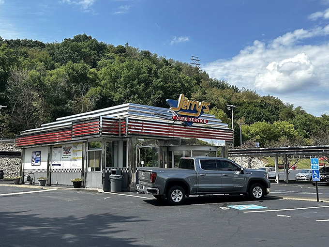 The gleaming chrome and red stripes of Jerry's Curb Service stand as a shining beacon of burger paradise against the Pennsylvania hills.