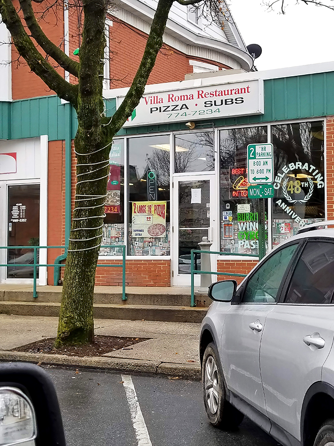 That unassuming brick facade hides culinary treasures that would make your Italian grandmother weep with joy.