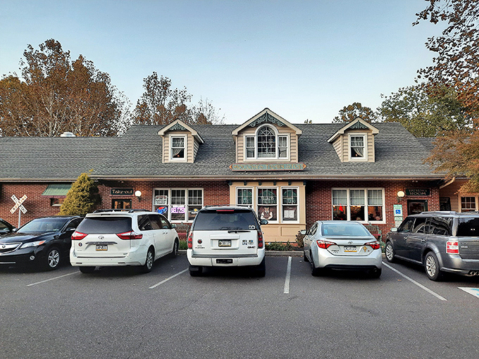 Moccia's charming exterior blends brick and siding with a pitched roof that whispers, "Come in, we've been expecting your appetite."