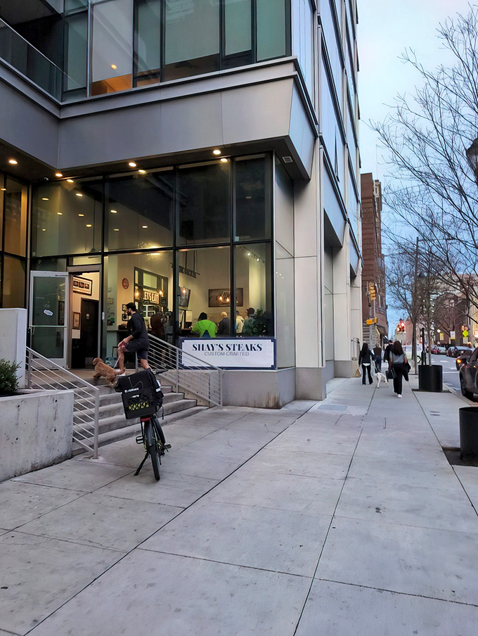 Behind this sleek glass facade lies Philadelphia's best-kept secret for premium steak sandwiches that redefine expectations.