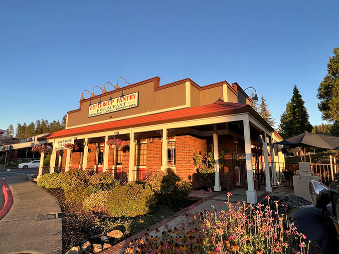 The iconic Buttercup Pantry sign stands tall against the California sky, like a lighthouse guiding hungry travelers to breakfast paradise.