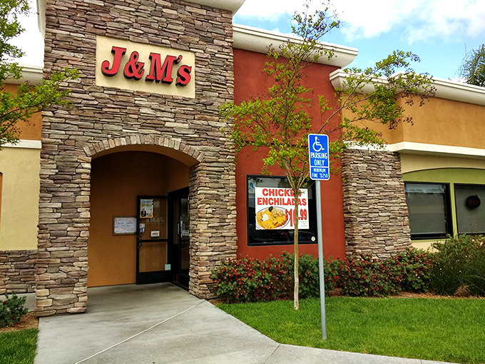 Stone meets stucco at this Escondido gem, where the bold red J & M's sign promises comfort food treasures within. The chicken enchiladas billboard isn't subtle, but neither is your hunger.