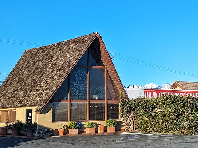 The unassuming exterior of Outpost Cafe stands like a desert mirage that actually delivers on its promise of culinary comfort.