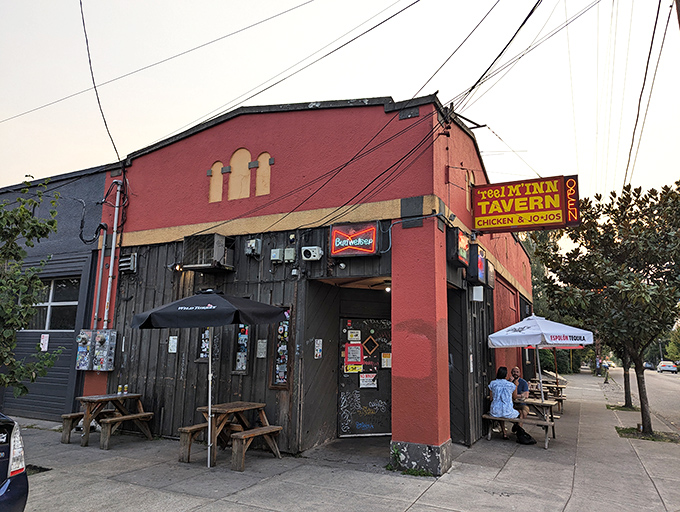 The unassuming red exterior of Reel M Inn stands like a beacon for fried chicken pilgrims. This corner tavern proves great food doesn't need fancy architecture.