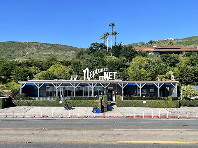 Neptune's Net stands proudly against the California sky, a beacon for seafood lovers and road warriors alike on the legendary Pacific Coast Highway.