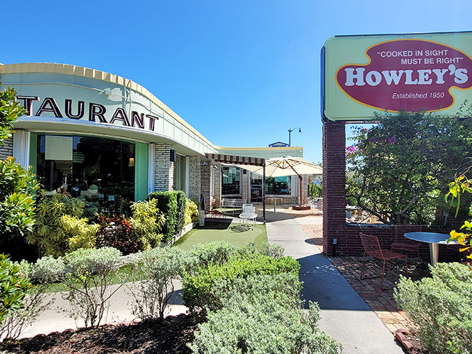 The mid-century modern fa&ccedil;ade of Howley's stands as a time capsule of Florida cool, complete with lush landscaping that says "come in, relax, you've found your happy place." 