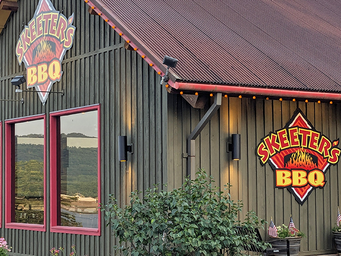 That unassuming green building holds more barbecue magic than a Vegas showroom holds sequins.