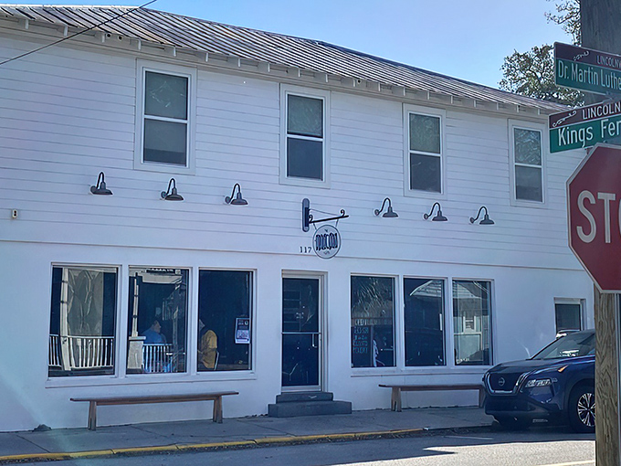 The line outside isn't a Florida mirage—it's breakfast devotees waiting for their morning salvation at this unassuming white building in historic Lincolnville.