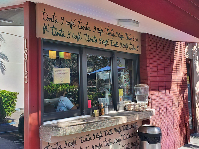 The burgundy exterior of Tinta Y Cafe beckons like a secret handshake among locals, its name repeating across the fa&ccedil;ade like a delicious mantra.