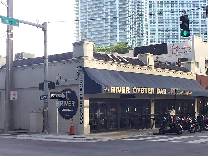 The iconic blue sign beckons seafood lovers like a lighthouse guiding hungry sailors home. Miami's Brickell neighborhood just got a whole lot tastier.