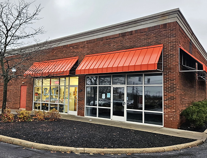 The iconic red awning of Eat at Joe's beckons like a lighthouse for hungry souls navigating the streets of South Euclid.
