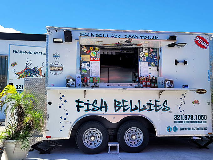 The culinary mothership has landed! Fish Bellies' unassuming white food truck promises seafood magic that would make Neptune himself line up with the locals.