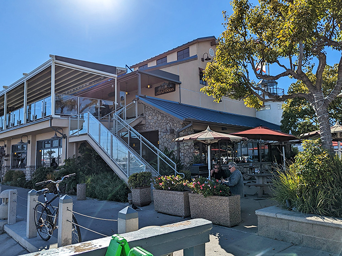 The lighthouse-shaped entrance isn't just architectural whimsy&mdash;it's a beacon calling seafood lovers home to Point Loma Seafoods in San Diego.