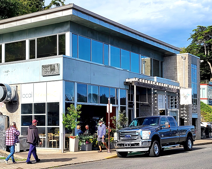 The blue building beckons like a maritime mirage. Local Ocean's unassuming exterior hides culinary treasures that would make Neptune himself swim upstream for a reservation.