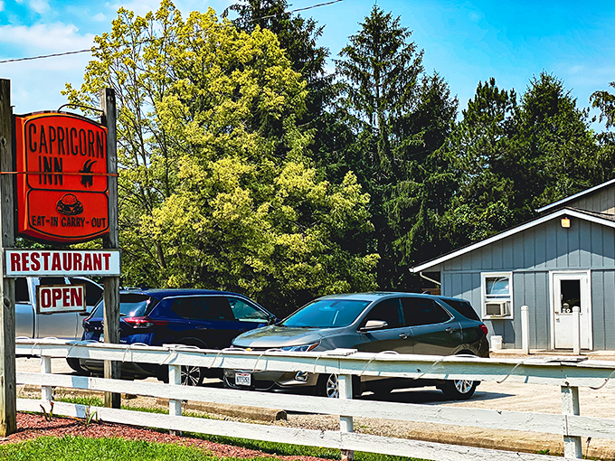 The unassuming blue exterior of Capricorn Inn stands like a culinary speakeasy, hiding delicious secrets behind its modest fa&ccedil;ade.