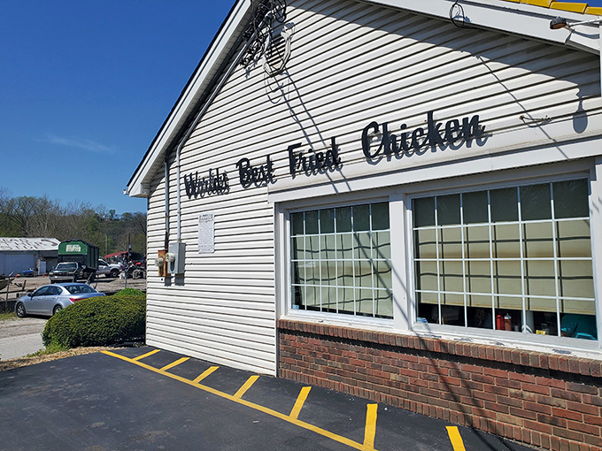 The modest white exterior boldly proclaims "World's Best Fried Chicken" &ndash; a claim that seems audacious until you taste what's cooking inside.