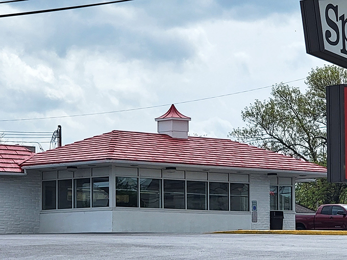 The iconic red roof of Speck's Drive-In stands as a beacon of comfort food in Collegeville, a time capsule of Americana serving deliciousness since before trendy was trendy.