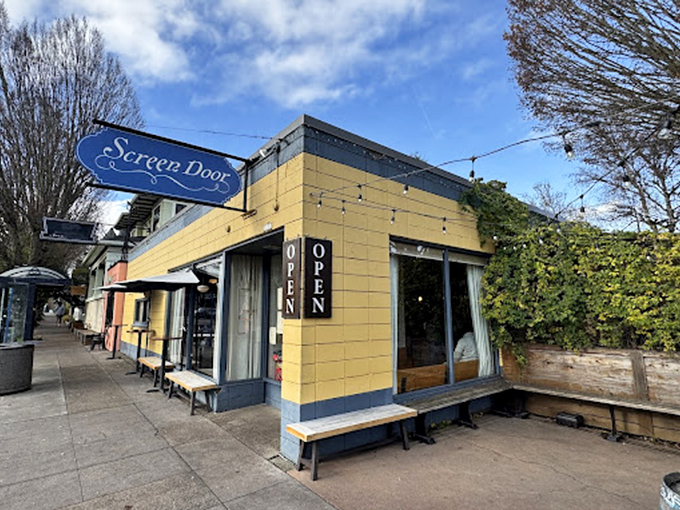 The unassuming yellow exterior of Screen Door hides culinary treasures within, like a Southern speakeasy in Portland's Eastside.