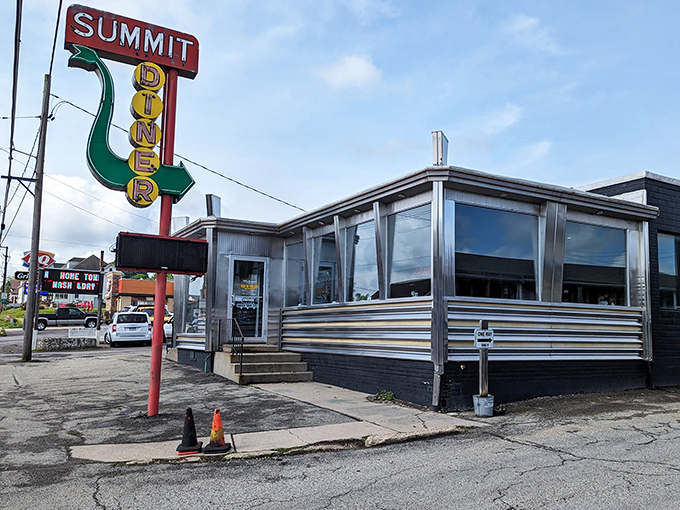 The gleaming stainless steel exterior of Summit Diner stands as a time capsule on wheels, promising comfort food and conversations that matter.