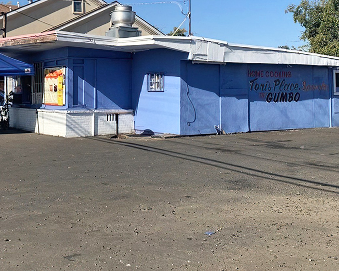 The vibrant blue exterior of Tori's Place boldly announces its specialty. Like a culinary bat-signal for gumbo lovers everywhere.