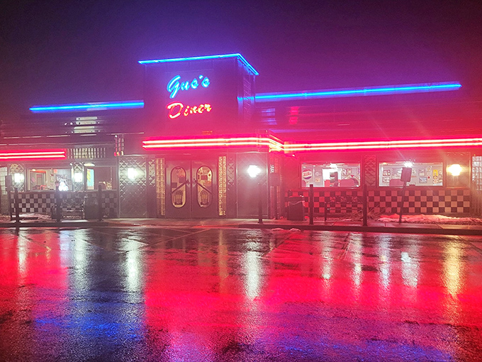 Chrome-trimmed and proud, Gus's Diner stands like a time capsule with its American flag waving a welcome to hungry travelers in Sun Prairie.