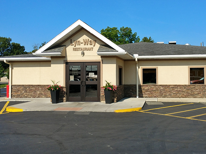 The unassuming exterior of Lyn-Way Restaurant stands like a culinary lighthouse in Ashland, beckoning hungry travelers with the promise of comfort food perfection.