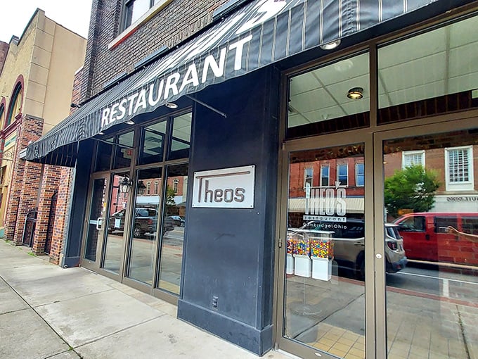 The classic black awning of Theo's Restaurant stands as a beacon of culinary promise in downtown Cambridge, inviting hungry travelers to discover what locals already know.