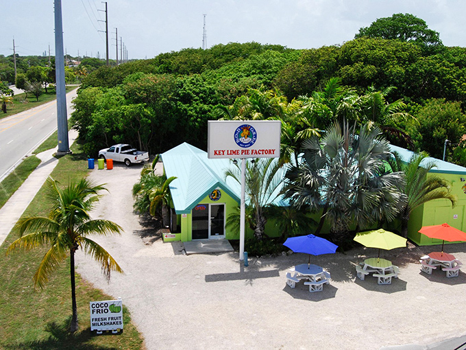 A slice of paradise painted lime green! The Blond Giraffe's charming exterior on Love Lock Way practically screams "Florida Keys" with its tropical landscaping and inviting vibe.