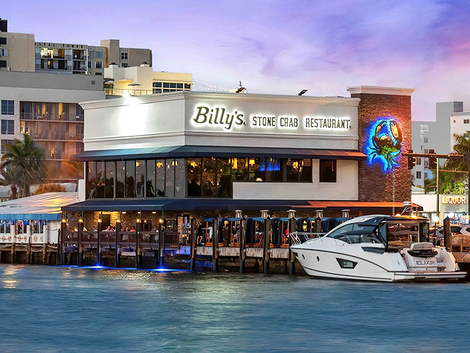 Waterfront dining doesn't get more literal than this. Billy's Stone Crab glows at twilight, with boats practically parking at your table.