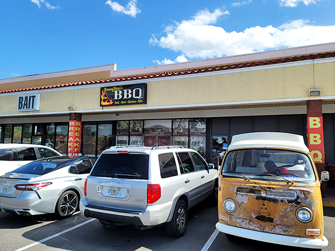 The unassuming storefront hides culinary treasures within. That vintage VW bus in the parking lot? Consider it your first clue that Jimmy Bear's isn't your average strip mall eatery.