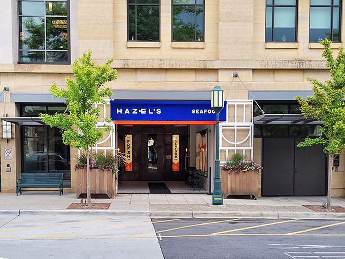 The blue awning of Hazel's stands out like a maritime beacon on Birmingham's streets, promising seafood treasures for landlocked Michiganders.
