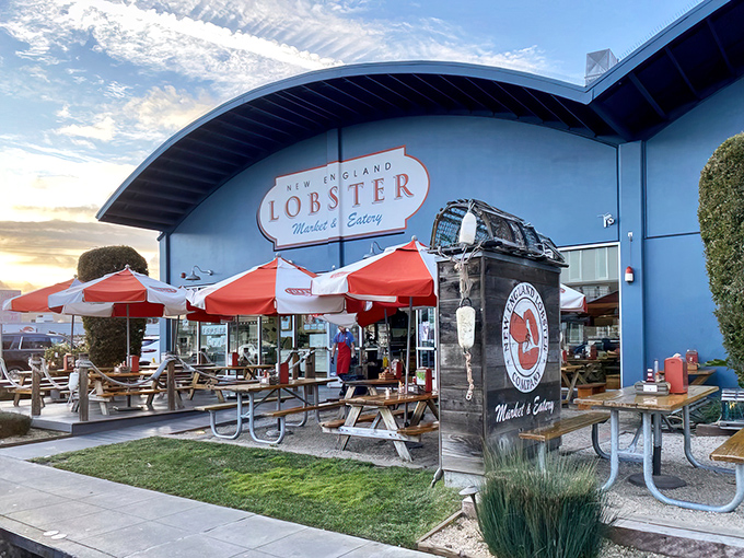 The blue building with its bold red "LOBSTER" sign stands like a maritime beacon in Burlingame's industrial landscape, promising seafood salvation just minutes from SFO.