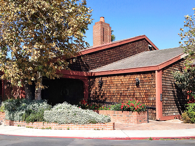 The brick fortress of flavor stands unassumingly in Irvine, its entrance promising old-world charm that feels delightfully out of place among California's palm trees.