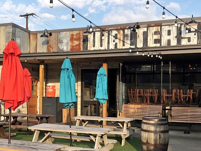 Walter's rustic exterior is like a siren song for BBQ lovers – weathered metal, colorful umbrellas, and picnic tables that practically whisper, "Sit down, stay awhile."