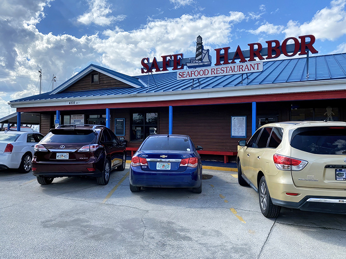 The blue-roofed sanctuary of seafood salvation stands unassumingly along Atlantic Beach's shoreline, promising treasures from the deep without an ounce of pretension.