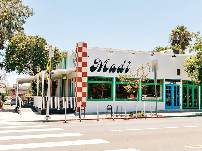 Checkered corners and vibrant green accents welcome you to breakfast paradise. San Diego mornings were made for this kind of porch-sitting splendor.