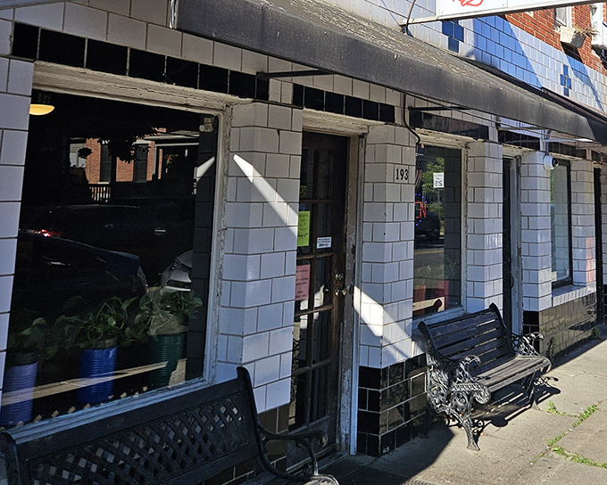 The unassuming white-tiled exterior of German Village Coffee Shop hides culinary treasures within. Like finding a Picasso at a yard sale.