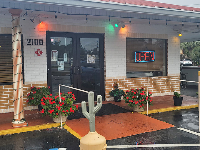 The unassuming exterior of Peggy's Country Kitchen proves once again that culinary treasures often hide behind modest facades. Those red flowers aren't just decoration—they're your first hint of the warmth waiting inside.