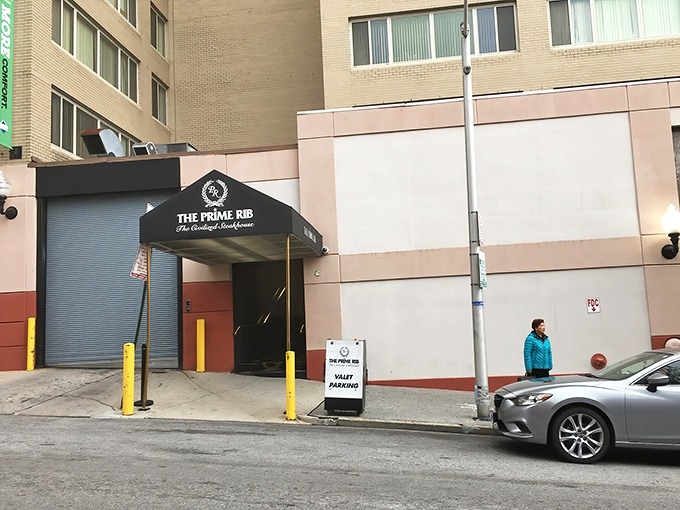 The unassuming entrance belies the culinary magic within—like finding out your quiet neighbor secretly moonlights as a magician specializing in beef-based illusions.