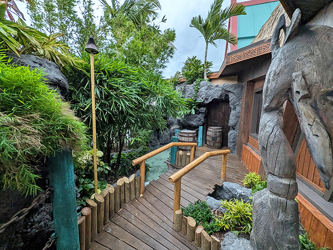 Wooden pathways wind through lush tropical gardens, creating the perfect entrance to this Polynesian paradise. Who needs a plane ticket to Bora Bora?