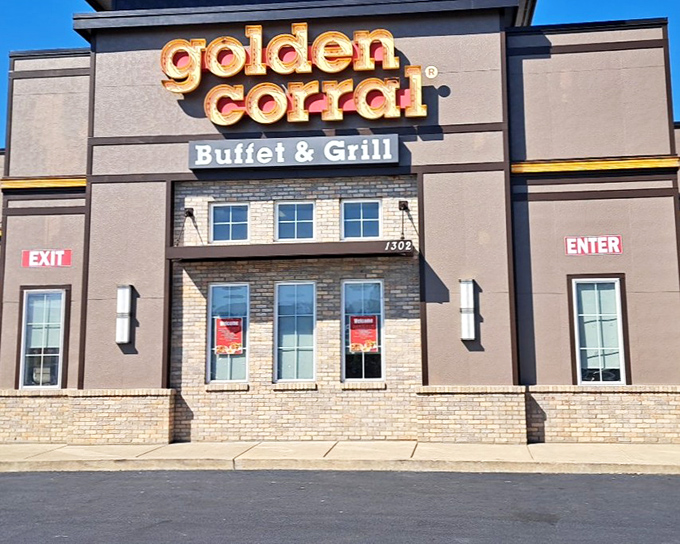 The Golden Corral's illuminated stone facade beckons hungry patrons like a Vegas-style beacon of buffet abundance, promising culinary adventures without the gambling.