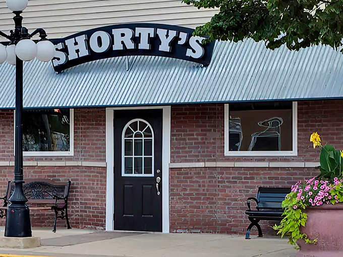 The unassuming brick exterior of Shorty's Steakhouse proves once again that the best culinary treasures often hide behind the most modest facades.