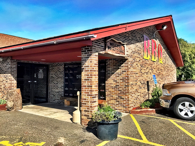 The brick exterior of Big Guy's BBQ Roadhouse promises smoky delights within. Like finding a treasure chest of meat in the Wisconsin countryside.