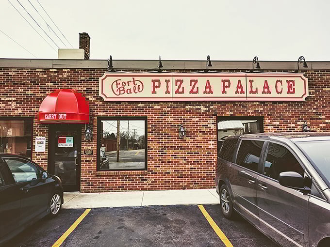 That classic brick facade hides culinary treasures that would make your Italian grandmother weep with joy.