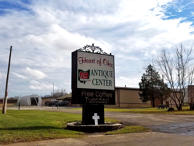 The unassuming exterior hides a universe of treasures within, like finding a portal to the past disguised as a roadside attraction.