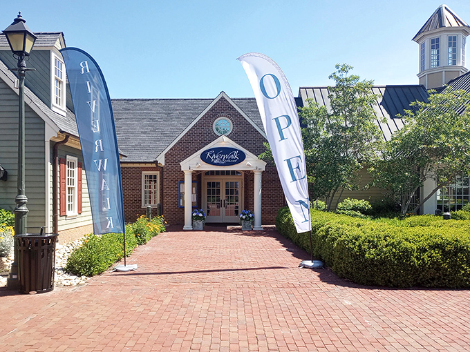 The entrance to Riverwalk beckons with colonial charm and those "OPEN" flags that might as well say "Yes, you deserve this today."