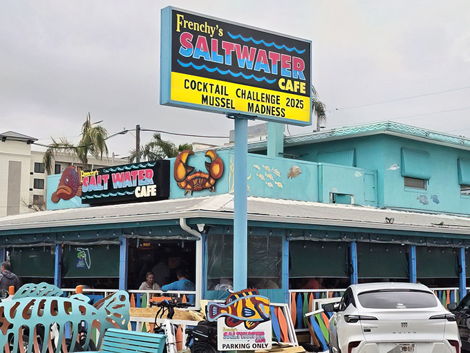 The turquoise beacon of seafood salvation! Frenchy's Saltwater Cafe stands out against the Clearwater sky like a delicious mirage for hungry beachgoers.