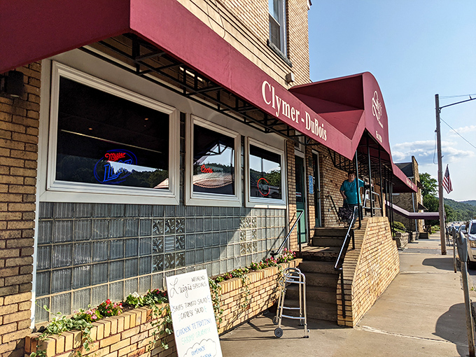 The unassuming brick exterior of Luigi's in Clymer might not scream "culinary destination," but that red awning is practically a beacon for those in the know.