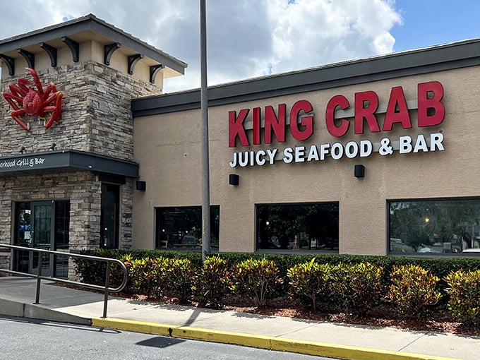 The giant red crab perched on stone might as well be waving you in&mdash;nature's own ma&icirc;tre d' promising oceanic delights within.